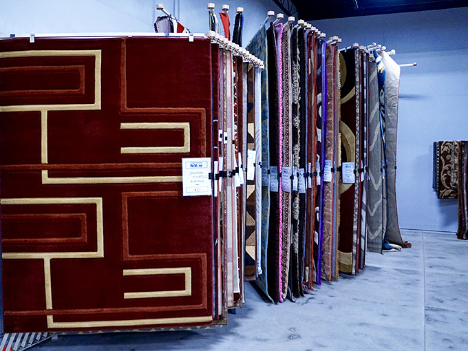 Carpet display that would make any interior designer's heart skip a beat. From geometric patterns to plush solids, floor fashion at its finest.