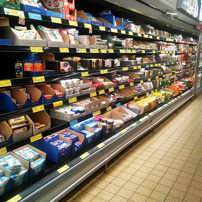 The refrigerated section&mdash;where dairy dreams come true without emptying your wallet. Those yellow price tags are practically winking at you with their affordability.