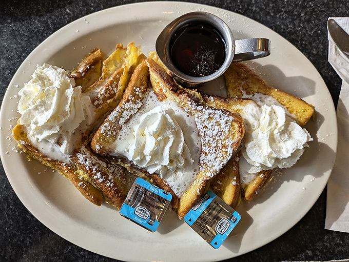 French toast that's dressed for success with powdered sugar, whipped cream, and maple syrup&mdash;breakfast's answer to formal wear.