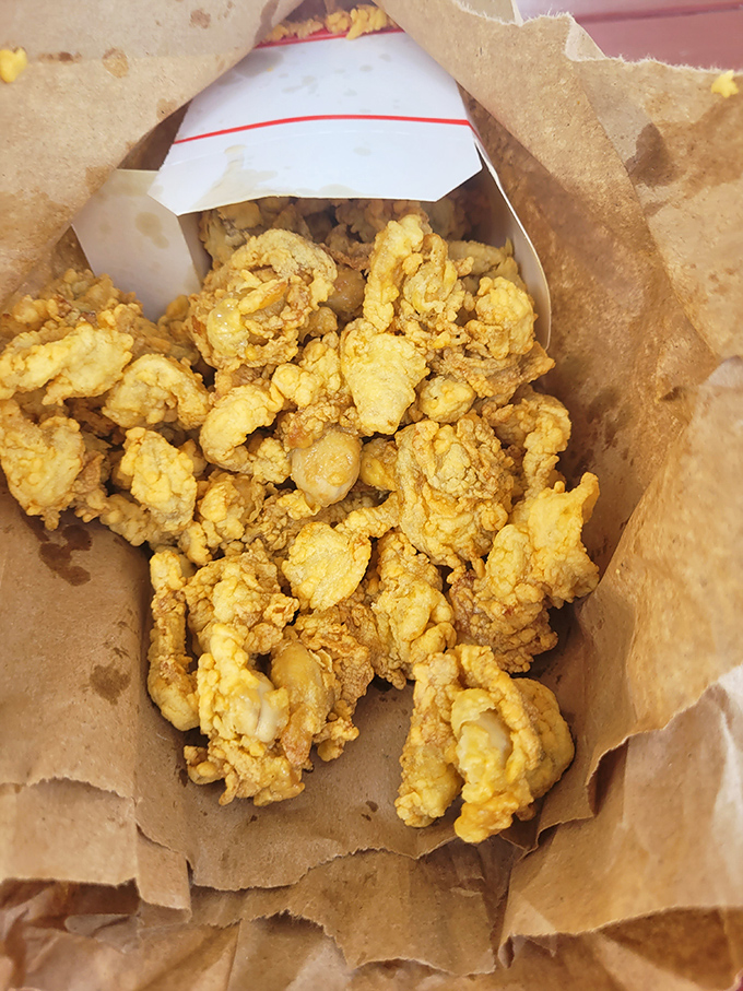 Golden treasures from the deep! These whole-belly Ipswich clams, fried to perfection, are what seafood pilgrimages are made for.