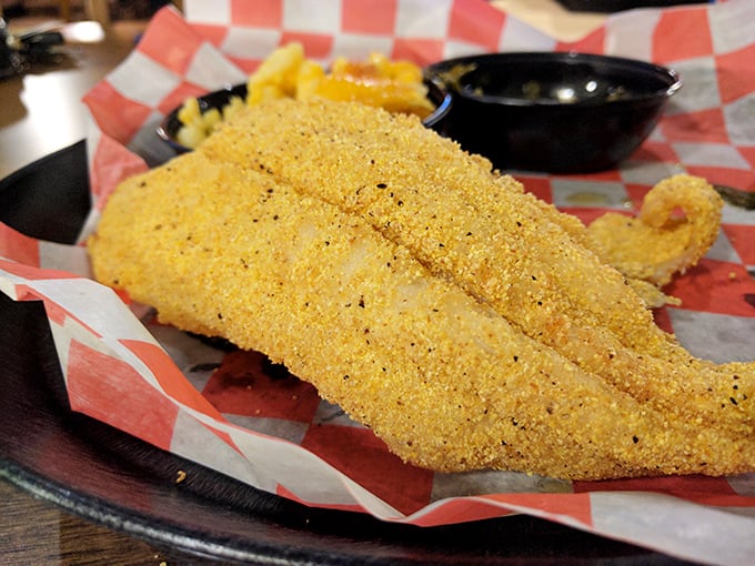 Cornmeal-crusted catfish that could convert even the most devoted chicken fan. The golden fillets promise flaky tenderness beneath that perfectly seasoned exterior.