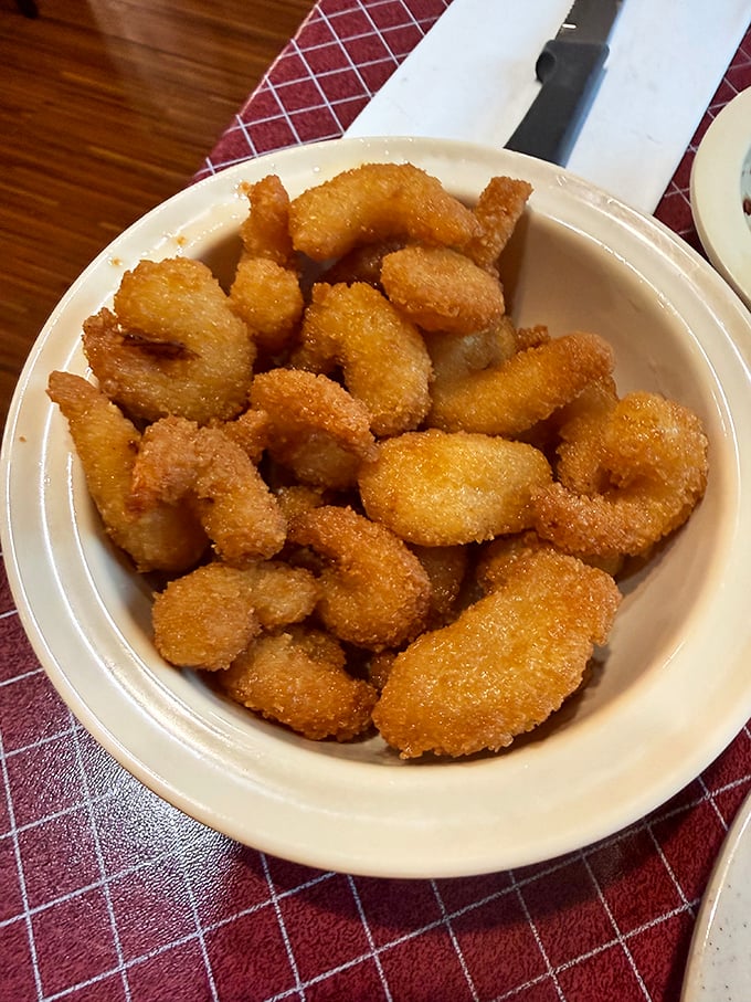 These golden nuggets of fried shrimp aren't just food; they're little armor-clad treasures from the deep, waiting to be discovered.