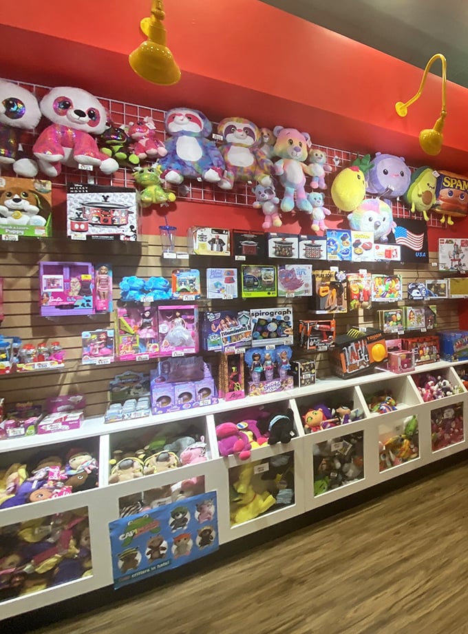 Plush paradise where stuffed pandas and colorful creatures silently judge your skill level, waiting to be won and inevitably named something ridiculous.