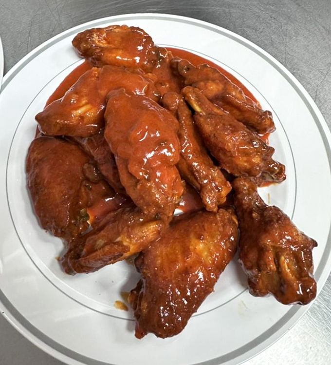 These wings aren't trying to kill you with heat &ndash; they're trying to seduce you with that perfect sticky-sweet-tangy sauce.