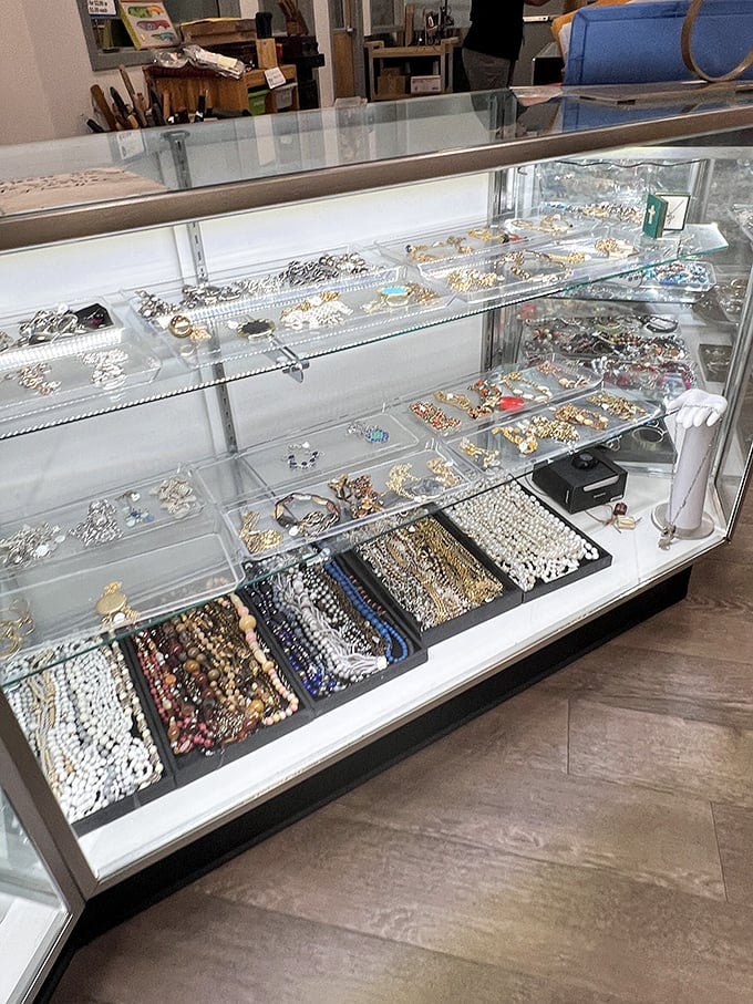 Jewelry that sparkles with possibility &ndash; where vintage brooches and contemporary beads coexist in glass-case harmony.