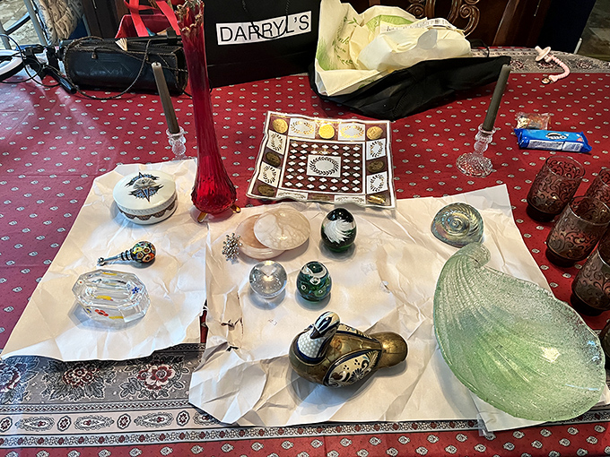 Treasure hunting at its finest&mdash;paperweights, glass sculptures, and miniature Dutch shoes create a tabletop museum of curiosities waiting for new homes.