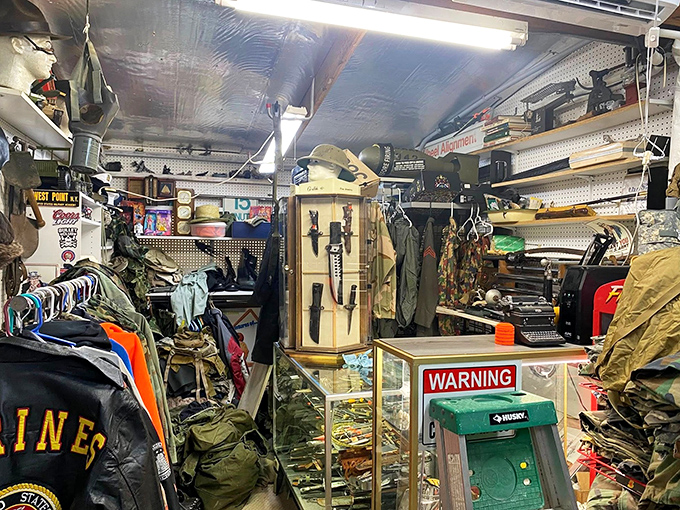 Military memorabilia tells silent stories of service, with vintage uniforms and gear creating a tactile timeline of American history.