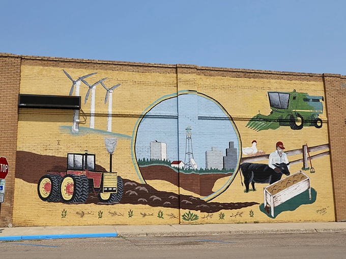 Local history painted large&mdash;this mural celebrates Edgeley's agricultural roots with tractors, wind turbines, and the daily rhythm of farm life that defines this community.