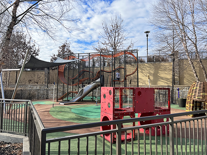 The thoughtfully designed playground area proves someone understands that "just five more minutes" in a store feels like eternity to children.