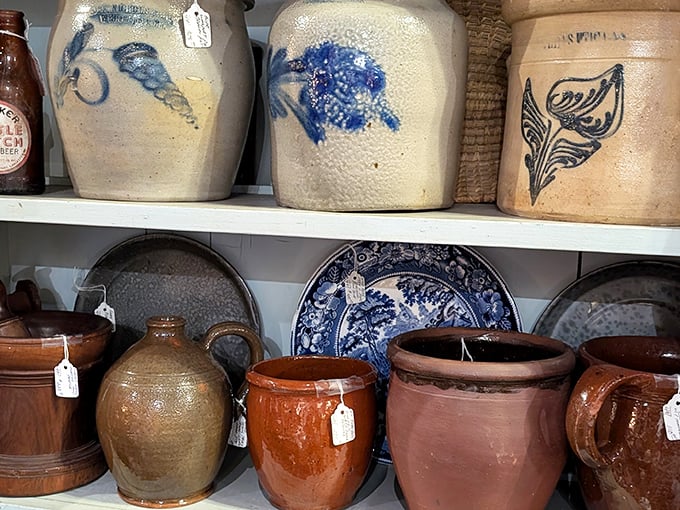These stoneware crocks have probably held everything from pickles to moonshine. The cobalt blue decorations are like tattoos from another era.