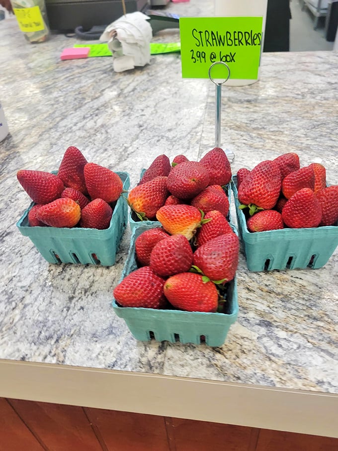 These strawberries aren't just fresh&mdash;they're having a beauty pageant right there in their little green baskets.