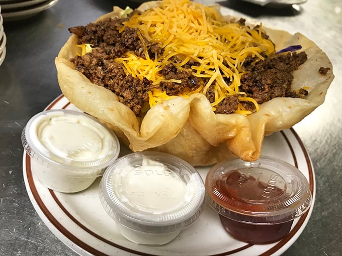 A taco salad bowl that doubles as edible architecture&mdash;crispy, savory, and generous enough to make you wonder if the kitchen accidentally doubled your order.