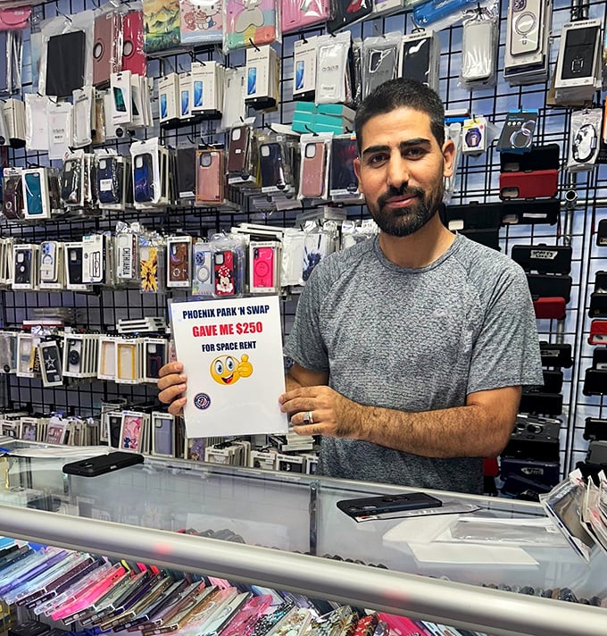 Every vendor has a story&mdash;and often a sign. This one's straightforward approach to space rental fees shows the refreshingly direct business style of swap meet culture.