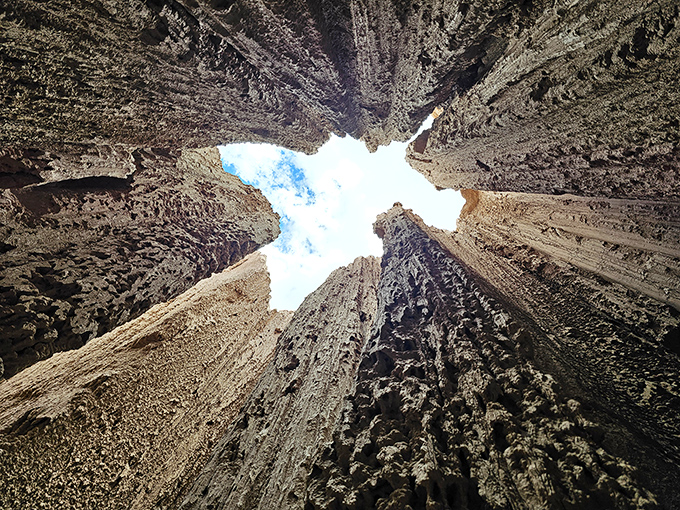 Looking up from the canyon floor gives you a whole new perspective on "big sky country." That sliver of blue feels like nature's own skylight.
