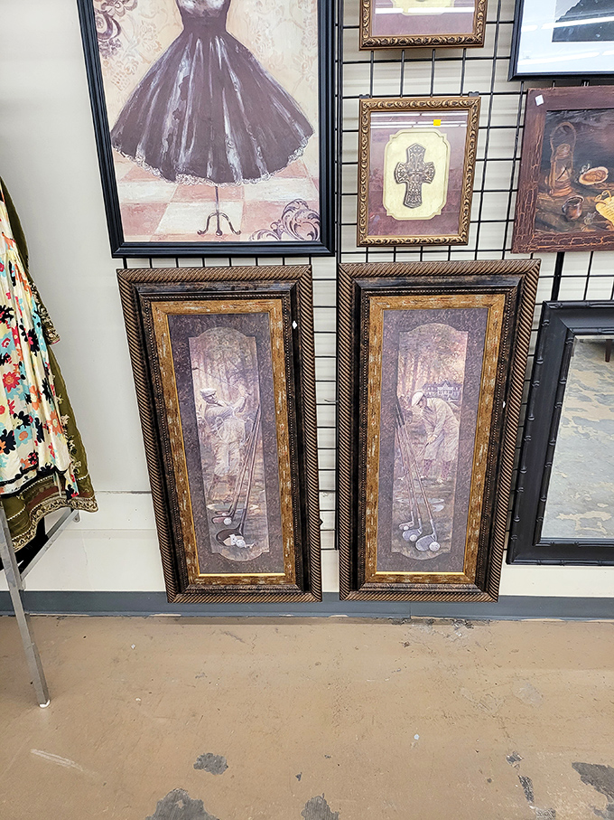 Wall art that spans decades and tastes. These golf-themed pieces might have once graced a country club before landing here.