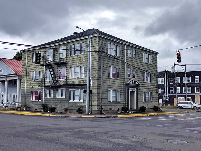 This muted green apartment building in Aberdeen has weathered coastal storms for decades, standing strong like the locals.