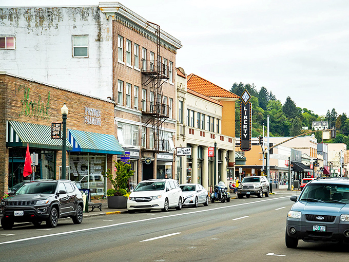 Astoria's charming downtown showcases historic brick buildings where locals and visitors enjoy shopping, dining, and exploring together.