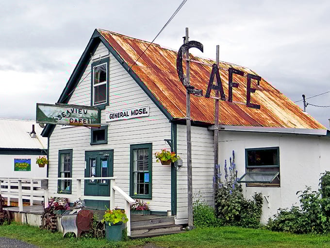 The rusty "CAFE" sign and weathered white boards tell stories of gold rush days still alive today.