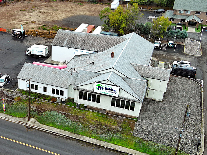 Bird's eye bargains! This aerial view shows the sprawling Lewiston Habitat Store where furniture treasures await discovery.