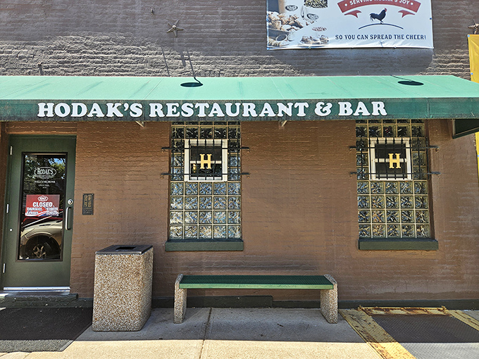 That modest green awning hides one of St. Louis' most beloved chicken institutions &ndash; no fancy frills, just decades of deep-fried excellence.