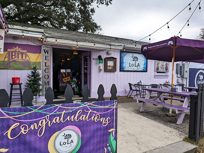 LoLA's playful purple cottage with festive decorations hints at the creative Cajun-Carolina fusion happening in this North Charleston gem.