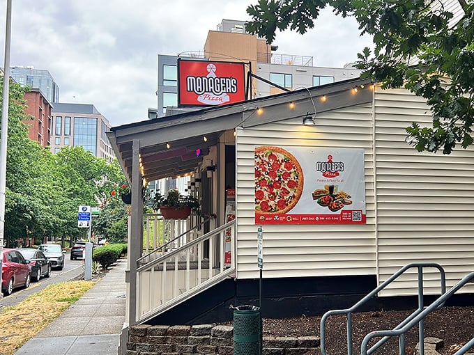 MANAGER'S PIZZA doesn't need fancy architecture&mdash;just a humble house transformed into a temple of cheesy, saucy delight.