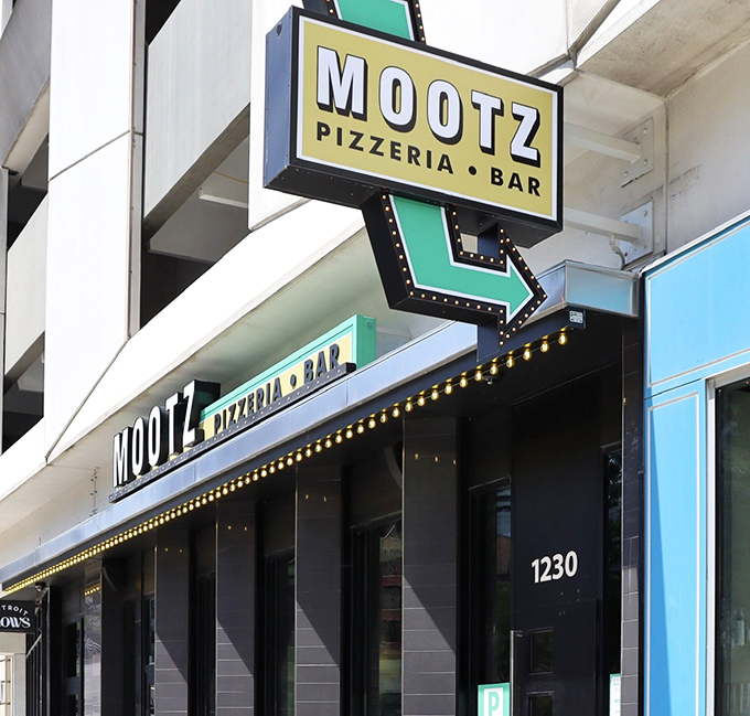 Urban pizza elegance with a sign that practically winks at you. The downtown location doesn't make it any less of a hidden gem.