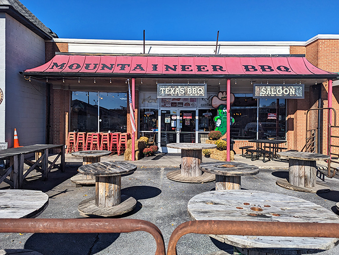 Texas meets West Virginia under this red awning, where cable-spool tables and serious BBQ create a down-home vibe worth traveling for.