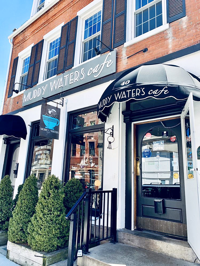 Muddy Waters Cafe's classic brick building with black awnings screams "Instagram me with your latte." New London's picture-perfect breakfast spot.