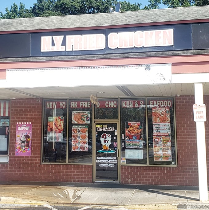 Classic brick and bold signage create the perfect no-nonsense atmosphere for serious fried chicken business.