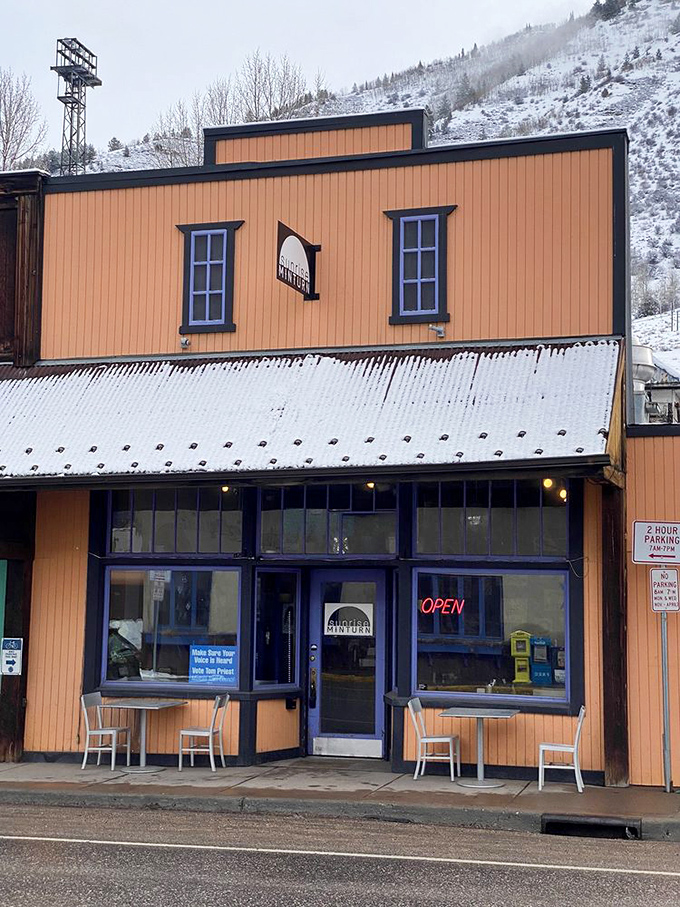 This sunny yellow building against snowy mountains is the breakfast equivalent of finding a $20 bill in your winter coat.