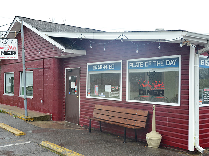 The rustic red exterior of Uncle John's with its "Grab-N-Go" window feels like stepping into a simpler, tastier time.