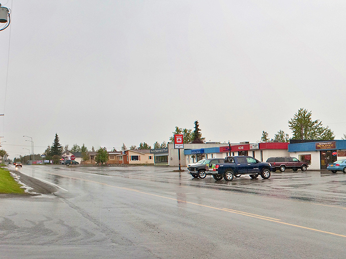 Wasilla's main street on a rainy day - where Alaskan small-town charm perseveres despite Mother Nature's persistent sprinkles.