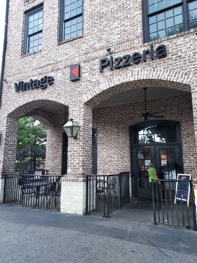 Vintage Pizzeria's charming brick arches frame the entrance like a portal to pizza paradise &ndash; where old-world craftsmanship meets new-world flavors.