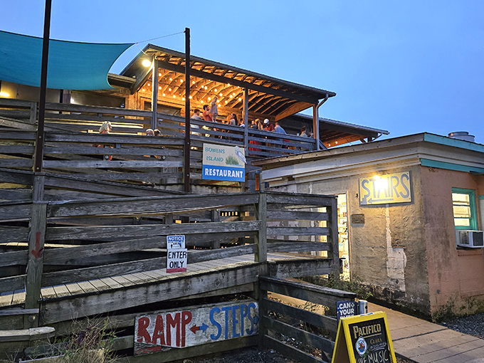 As evening falls, this ramshackle seafood sanctuary transforms into a twinkling hideaway where oysters and sunset views compete for attention.
