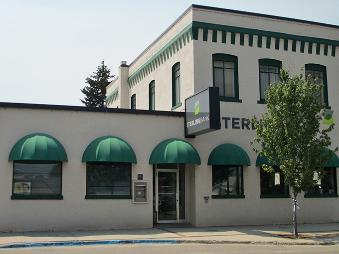 This charming bank building with its distinctive green awnings adds historic character to Cascade's walkable downtown district near the lake.