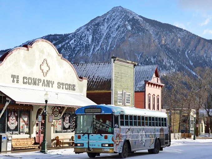 Crested Butte&rsquo;s historic downtown blends old mining-town character with mountain views rising just beyond the street.