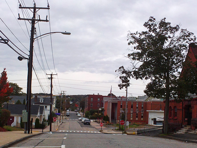 The view down Derby's main thoroughfare reveals a town designed long before the automobile, where everything you need sits comfortably within walking distance.