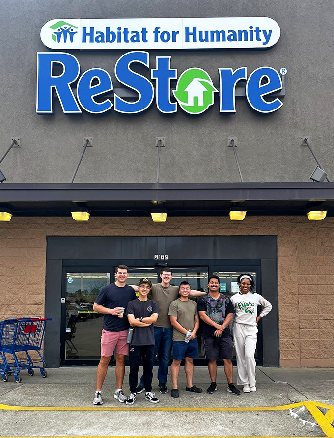 The sign says it all&mdash;ReStore volunteers making a difference one donated sofa, table, and chair at a time.