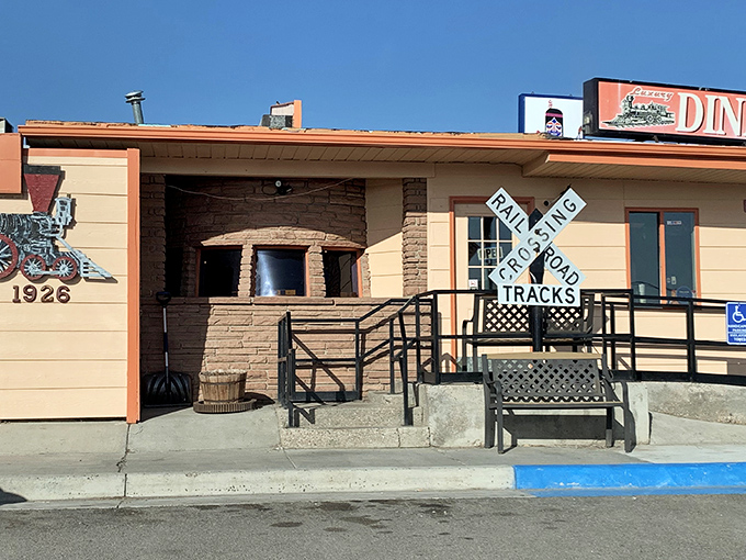 Those railroad crossing signs aren't just decoration - they signal you've arrived at something truly special.