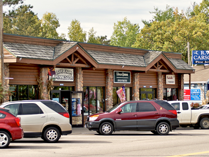 Rustic log cabin storefronts in Nisswa invite you to discover treasures that scream "Up North" without saying a word.