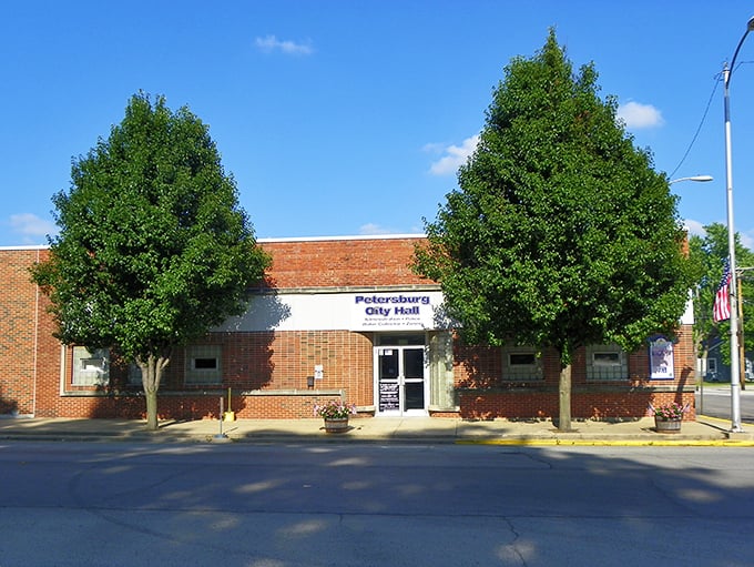 Living history breathes through log cabins where young Abe Lincoln split rails and dreams.