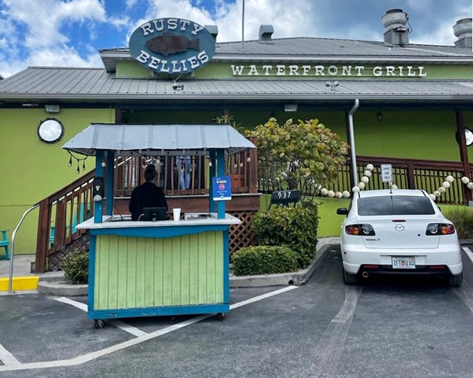 Rusty Bellies' charming entrance with its blue-trimmed kiosk welcomes hungry visitors. Florida seafood doesn't get more authentic than this colorful local landmark.