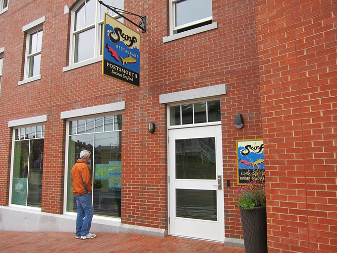 Behind that simple blue sign lies seafood sophistication that doesn't sacrifice freshness for its downtown address.