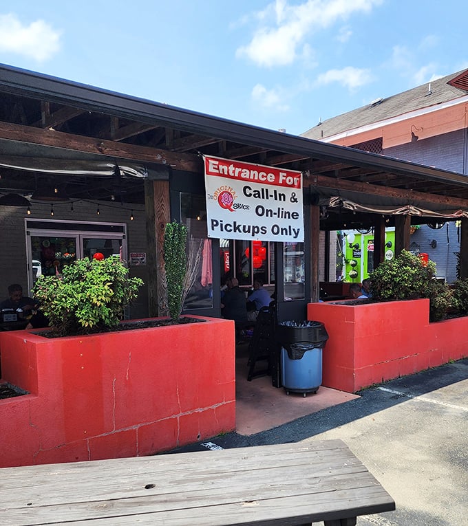 Bold colors and an inviting entrance at The Q Shack&mdash;where barbecue traditions get a modern twist without losing their soul.