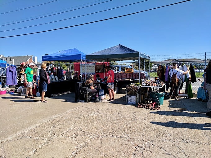 Shoppers browse under tents at The Flea Off Market. Urban treasure hunting with a festival vibe that makes shopping feel like a party.