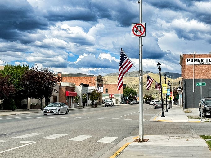 American flags line Townsend's welcoming main street, where small-town Montana shows its patriotic spirit against dramatic mountain backdrops.