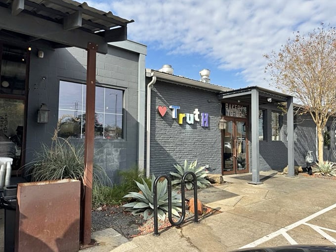 Franklin Barbecue's iconic sign against the Austin sky - worth every minute of that legendary wait.