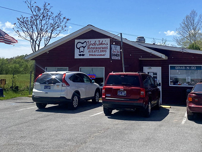 When a restaurant sign changes to someone else's name but keeps "Restaurant" underneath, you know you've found authentic local flavor.