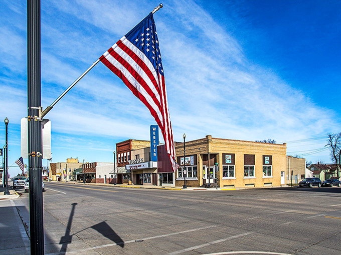 American flags line Webster's welcoming Main Street, where your Social Security check stretches further than your morning walk downtown.
